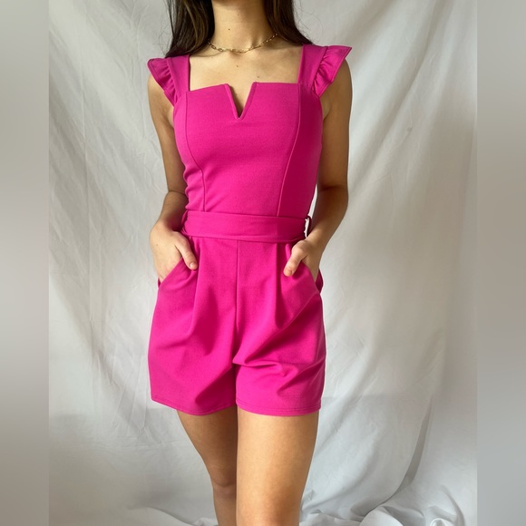 Pants & Jumpsuits | Hot Pink Romper With Ruffle Sleeves Pockets And A ...